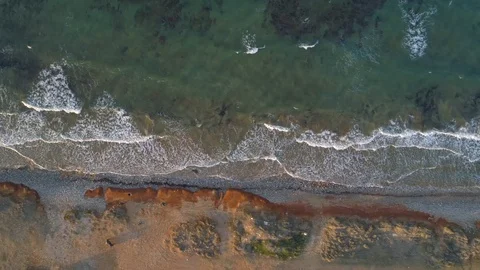 Pretty aerial view of the sea and the be... | Stock Video | Pond5
