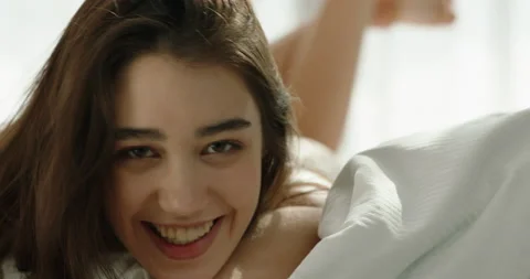 Pretty asian gen z girl looking at camer... | Stock Video | Pond5