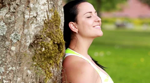 Pretty brunette drinking from water bott... | Stock Video | Pond5