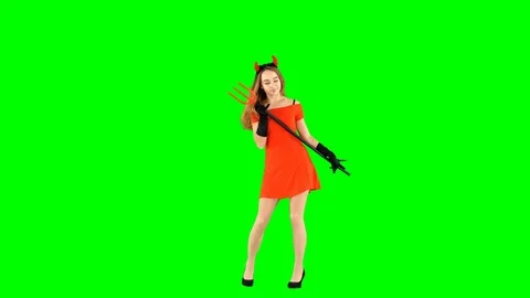 Pretty Female in Devil Halloween Costume... | Stock Video | Pond5
