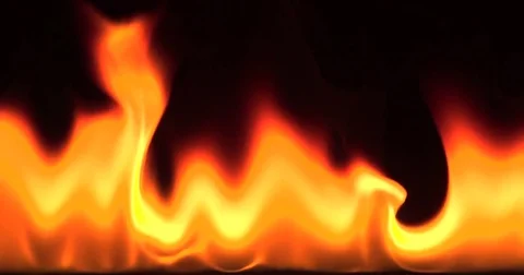 Pretty fire flames background filmed in ... | Stock Video | Pond5