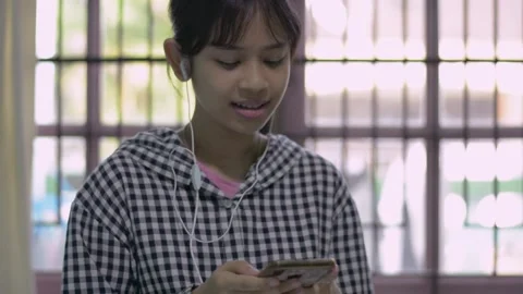 Pretty girl talking to her friend with v... | Stock Video | Pond5