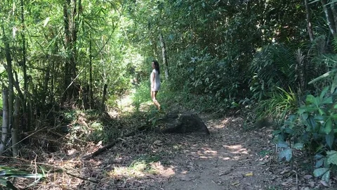 Pretty girl walking Amazonian rainforest... | Stock Video | Pond5