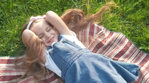 Little Girls Laying Down Stock Videos – Royalty-Free HD & 4K Videos