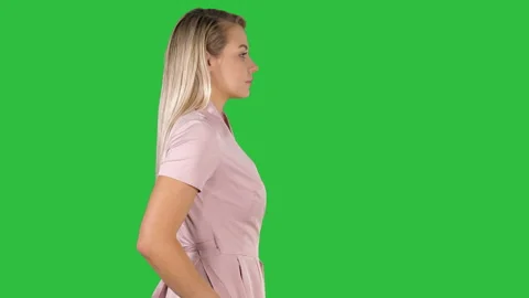 Pretty woman walks on a Green Screen, Ch... | Stock Video | Pond5