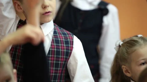 Primary school students answer at the le... | Stock Video | Pond5