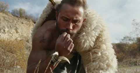 Primitive hunter gatherer wearing a shee... | Stock Video | Pond5