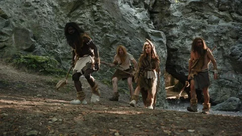 Primitive tribe of wary neanderthals wal... | Stock Video | Pond5