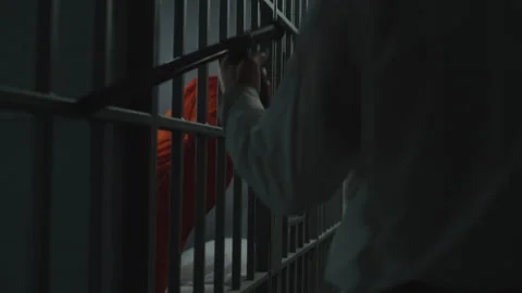 Prison guard with police baton watches c... | Stock Video | Pond5