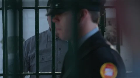 Prison Guard in Uniform patrols past Jai... | Stock Video | Pond5