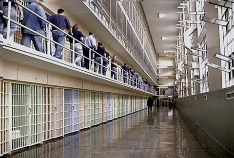 Prison inmates walking along a second-ti... | Stock Video | Pond5