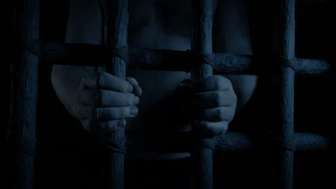 Prisoner In Dark Medieval Jail Cell | Stock Video | Pond5