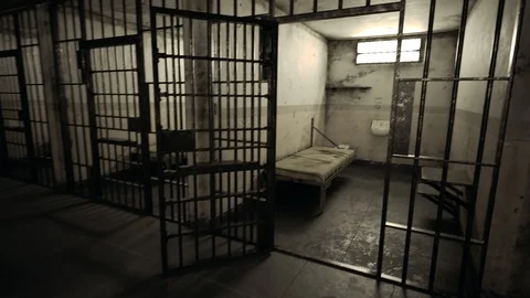 Prisoner enter into the prison cell. Poi... | Stock Video | Pond5