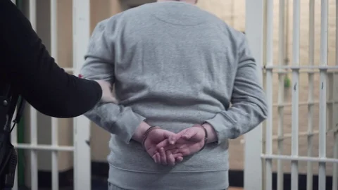 Prisoner Feet Chains And Handcuffs Escor... | Stock Video | Pond5