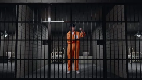 Prisoner In Prison, Smiling, Showing The... | Stock Video | Pond5
