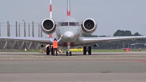 Private Jet arrival at Airport Stands wi... | Stock Video | Pond5