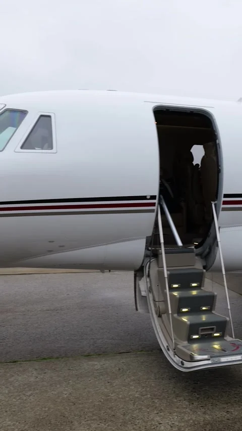 private jet door stairs deployed elegant... | Stock Video | Pond5