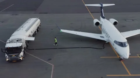 Private jet getting fueled up by aviatio... | Stock Video | Pond5