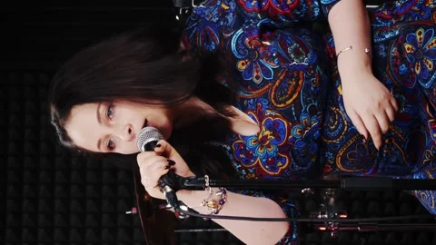 Pro female singer performing song into m... | Stock Video | Pond5