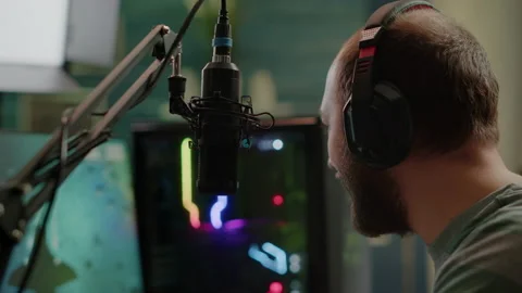 Pro streamer sitting on gaming chair tal... | Stock Video | Pond5