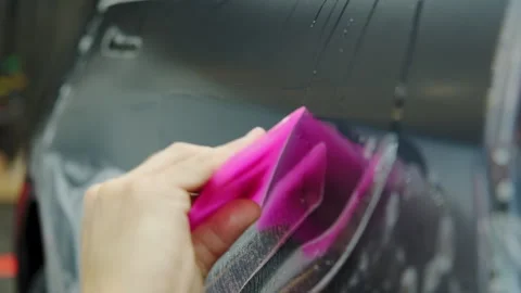 Process of applying a protective PPF fil... | Stock Video | Pond5