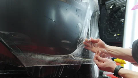 Process of applying a protective PPF fil... | Stock Video | Pond5