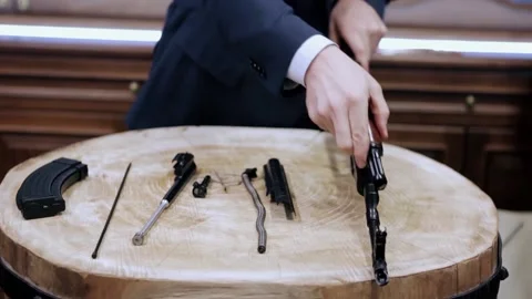 Process of assembly of the Kalashnikov r... | Stock Video | Pond5