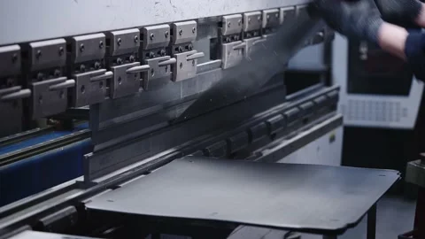 The process of bending steel sheet in pr... | Stock Video | Pond5