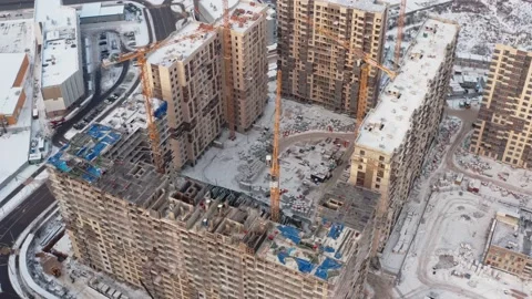 the process of building modern houses in... | Stock Video | Pond5