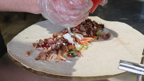 Process of cooking shawarma. Chicken sha... | Stock Video | Pond5