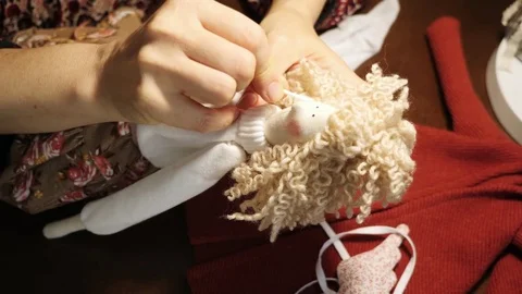 Process of creating a doll: master draws... | Stock Video | Pond5