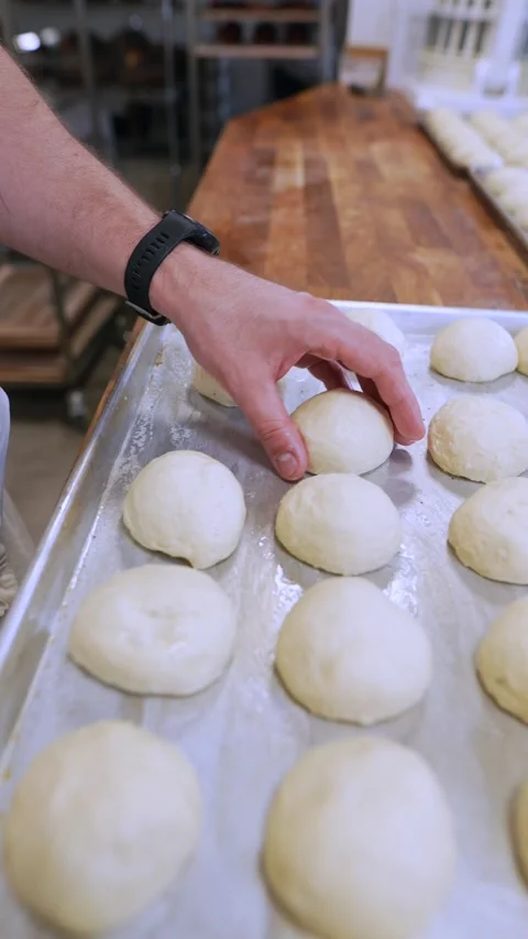 The process of dividing dough for rolls ... | Stock Video | Pond5
