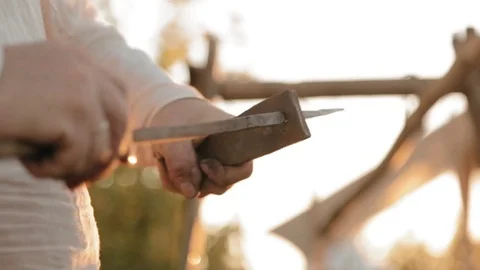 Process of forging the iron rod by the m... | Stock Video | Pond5