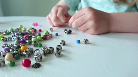 Process of making a bracelet from a thre... | Stock Video | Pond5