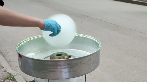 The process of making cotton candy in th... | Stock Video | Pond5