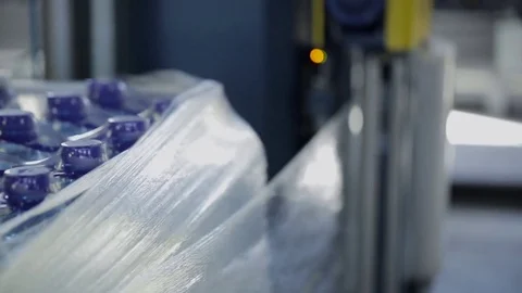 Process of packaging plastic bottles wit... | Stock Video | Pond5