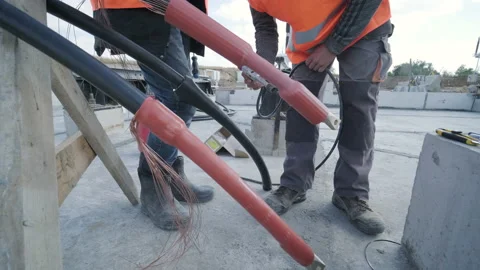 Processing of power cable in the constru... | Stock Video | Pond5