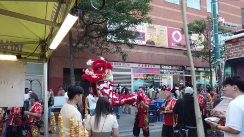 Procession of Chinese dragons to the sou... | Stock Video | Pond5