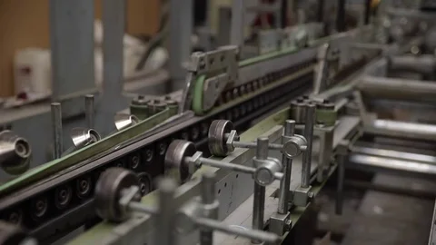Product packaging being folded by machin... | Stock Video | Pond5
