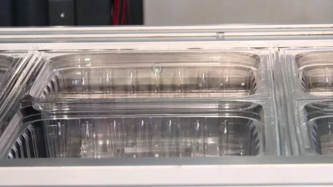 Production of plastic food containers. | Stock Video | Pond5