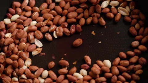 Production process roasted crunchy nuts.... | Stock Video | Pond5