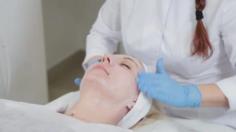 Professional beautician woman rubbing ge... | Stock Video | Pond5