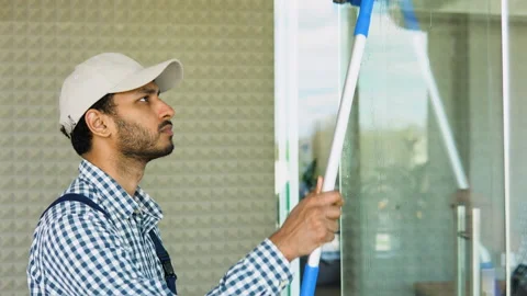 Professional cleaning, indian man washes... | Stock Video | Pond5