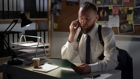 A professional detective works on a murd... | Stock Video | Pond5