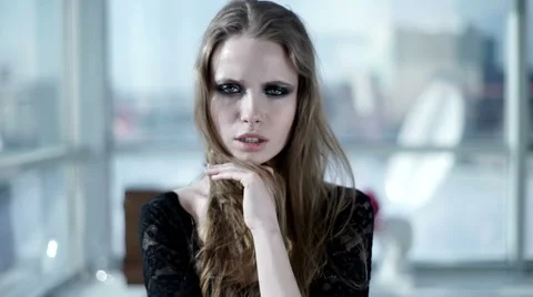 Professional fashion model looking into ... | Stock Video | Pond5