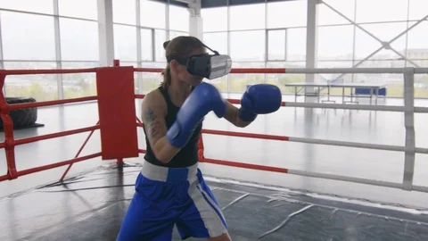 Professional Female Fighter in VR Headse... | Stock Video | Pond5