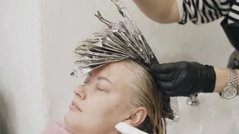 Hair Bleaching Stock Footage ~ Royalty Free Stock Videos | Pond5