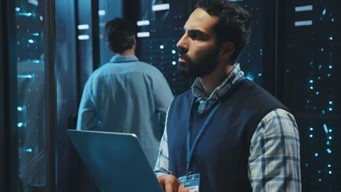 Professional IT engineer working in netw... | Stock Video | Pond5