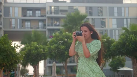 Professional photographer, woman clicks ... | Stock Video | Pond5