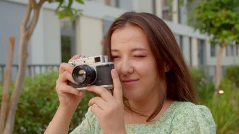 Professional photographer, woman clicks ... | Stock Video | Pond5